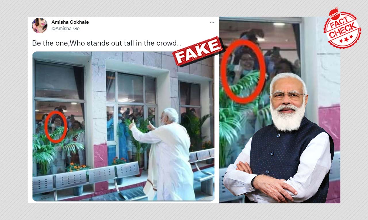 Viral Photo Of A Healthcare Worker Gesturing At PM Modi Is Morphed | BOOM