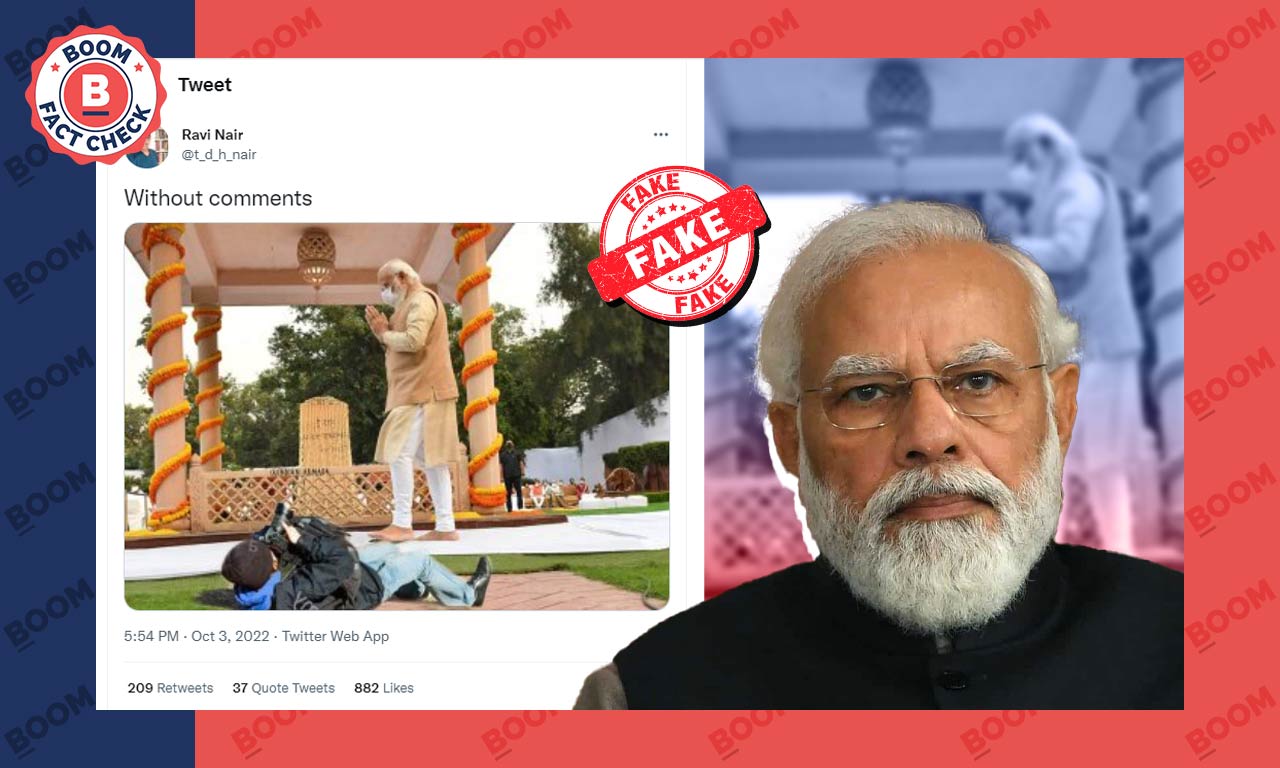 Image Of Photographer Lying On The Ground To Click PM Modi Is Fake | BOOM